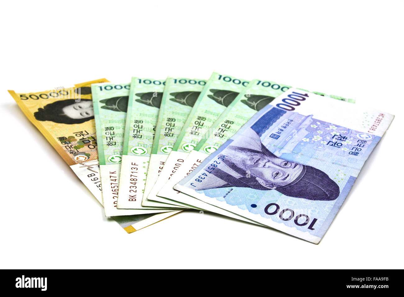 Korean Won currency bills isolated on white background Stock Photo - Alamy