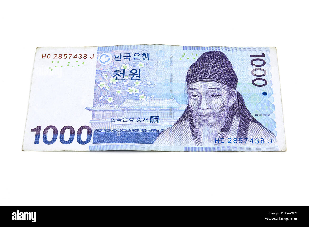 Korean Won currency bills isolated on white background Stock Photo - Alamy