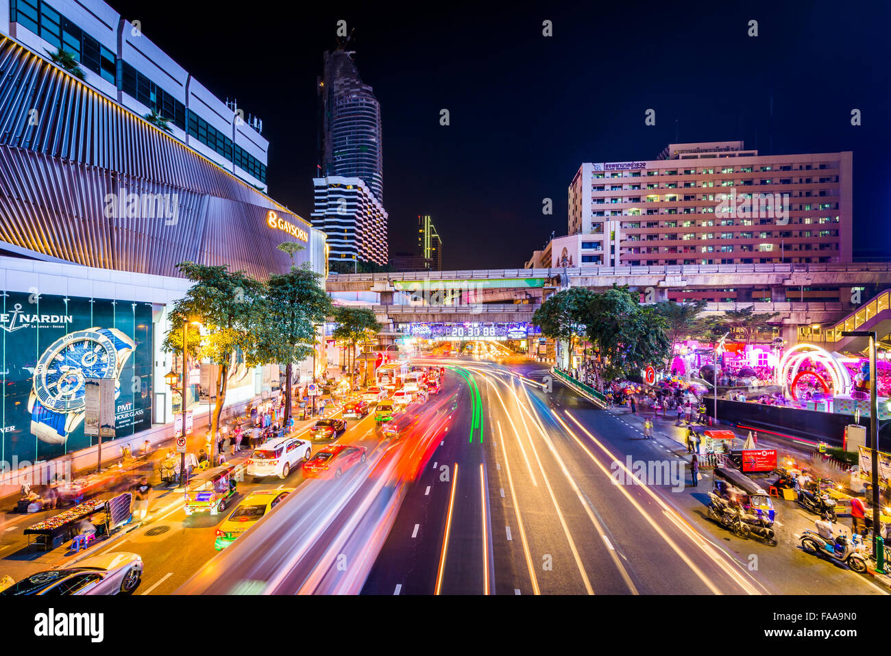 Long exposure of traffic and modern buildings on Ratchadamri Road at ...
