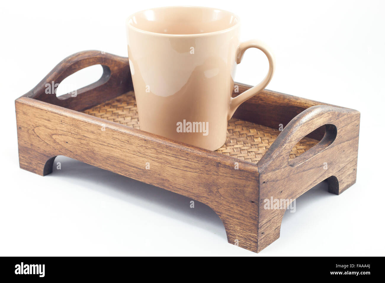Brown mug on wooden tray isolated on white background, stock photo ...