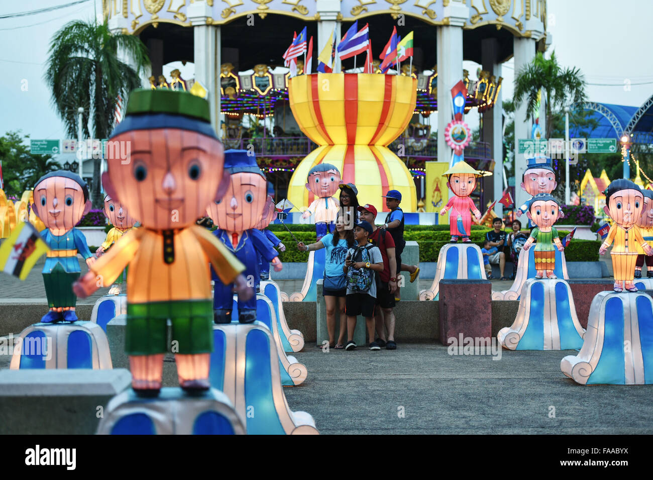 Bangkok. 24th Dec, 2015. Visitors take photos with lanterns on the ...