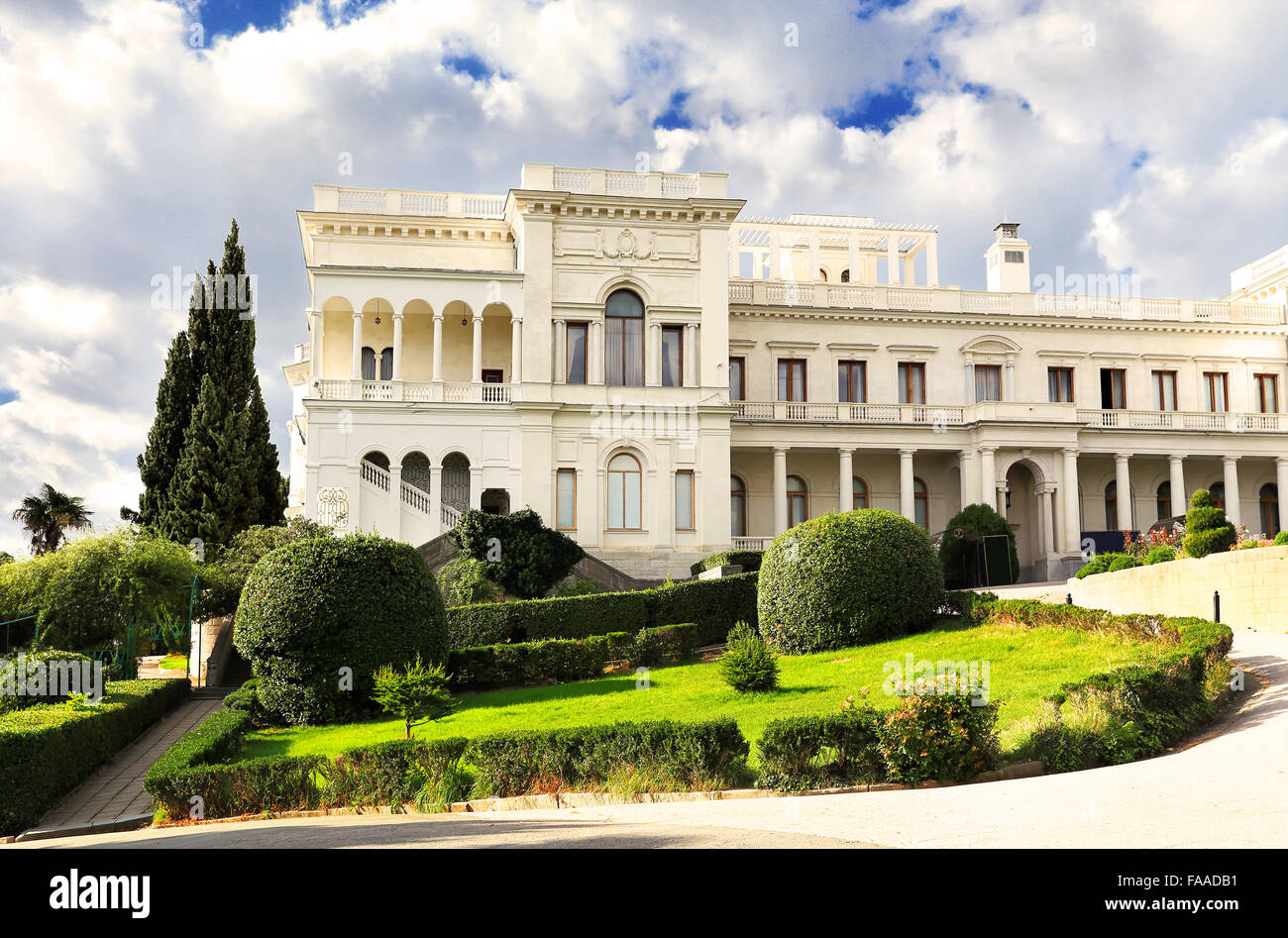 White Palace within subtropical cypress trees, pines and palm trees ...