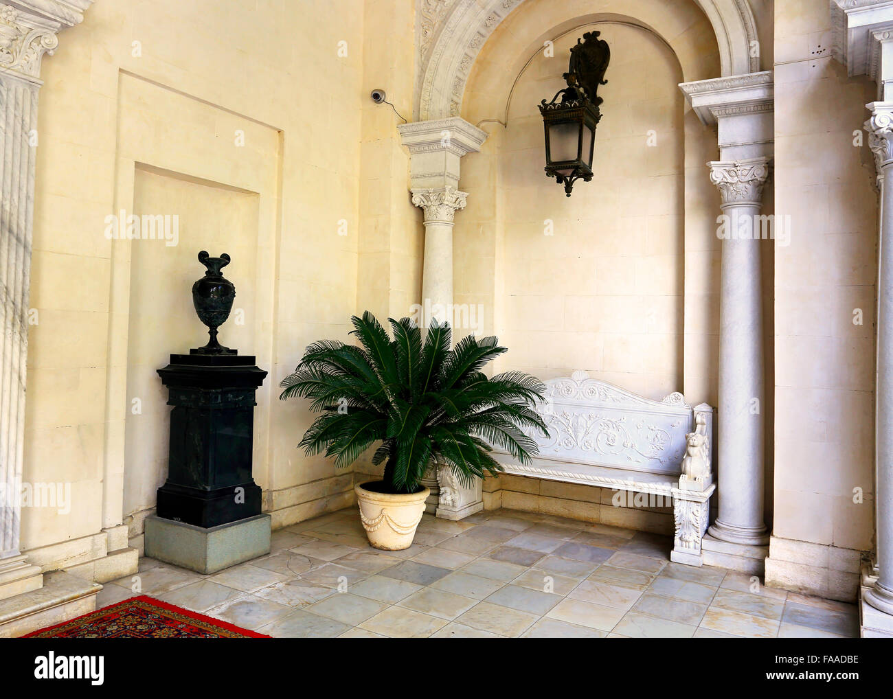 Iterior of the marble white classical palace with arches, columns and ...