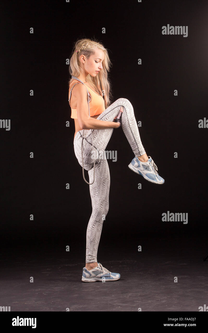 Pretty girl sprained foot by rope. Caucasian dancer girls, isolated ...