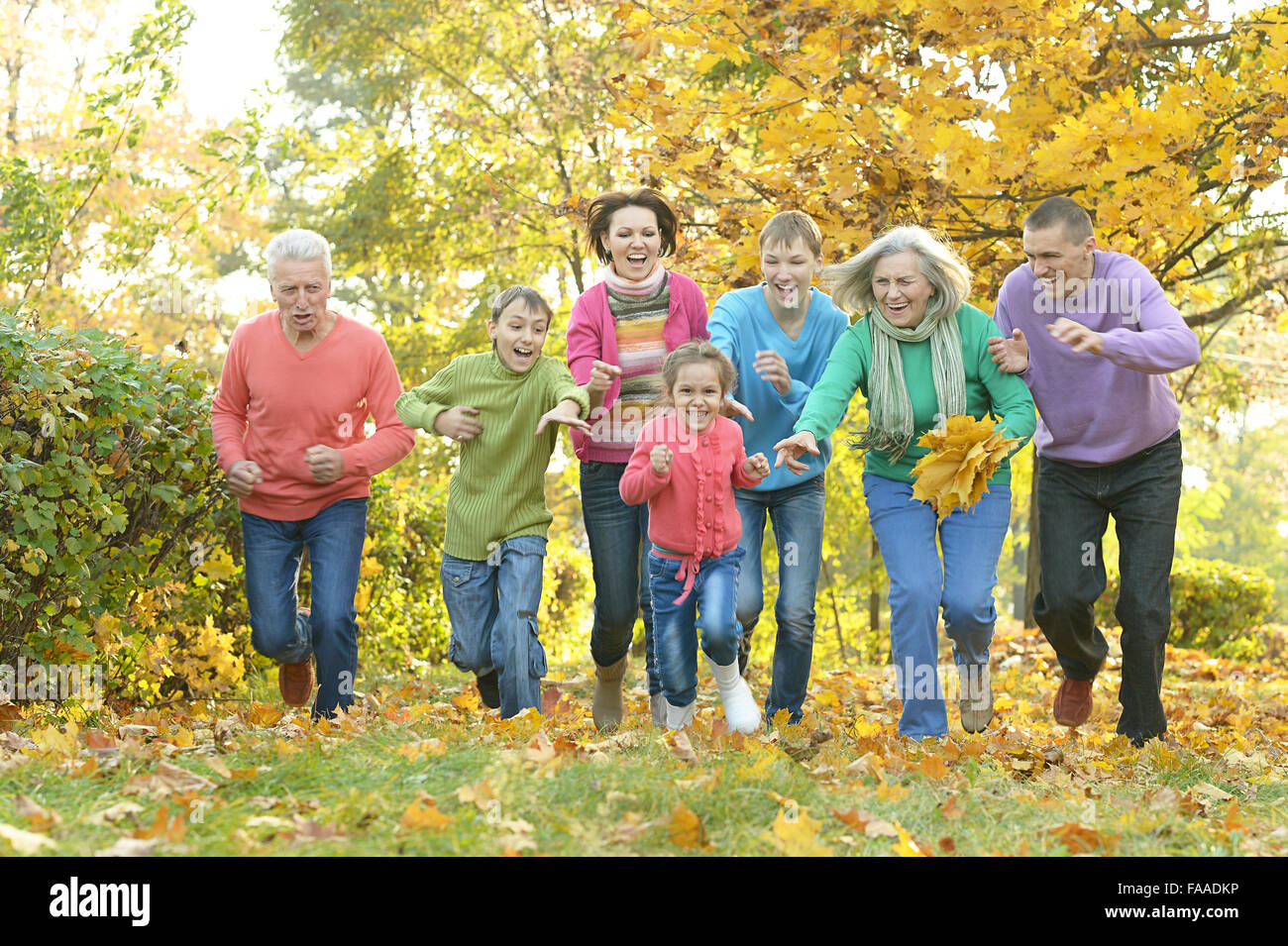 family running together Stock Photo - Alamy