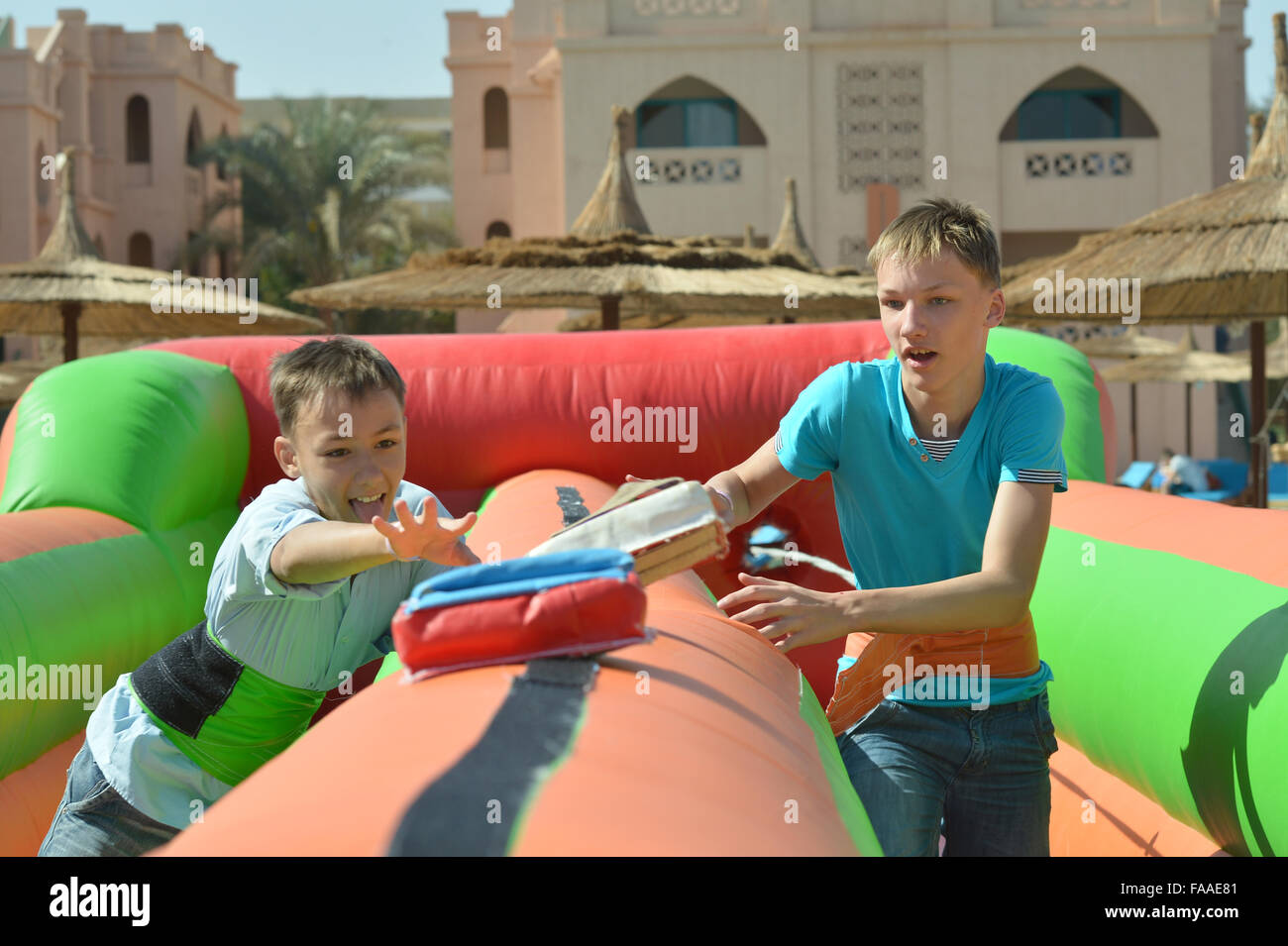 Boys having fun in park Stock Photo - Alamy