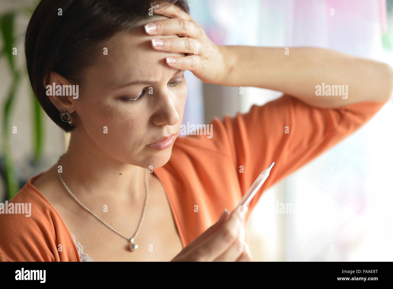 Young woman feels sickness Stock Photo - Alamy