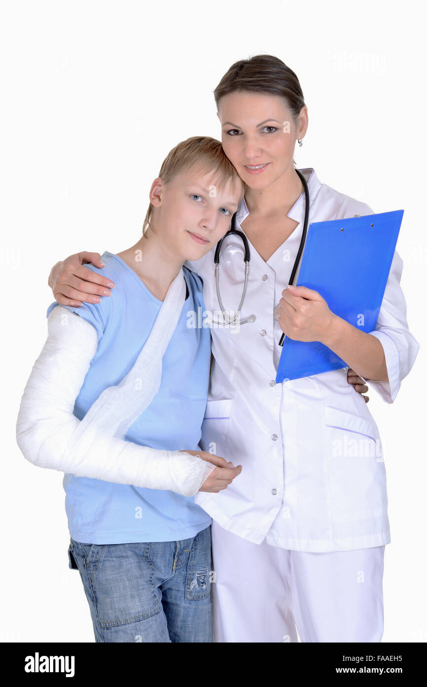 Doctor and young boy with a broken arm Stock Photo - Alamy