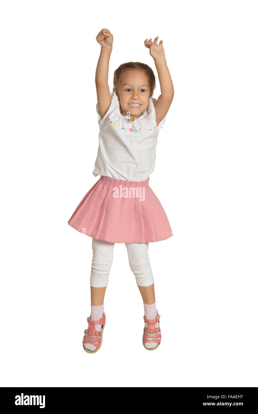 Cute little girl jumping Stock Photo - Alamy