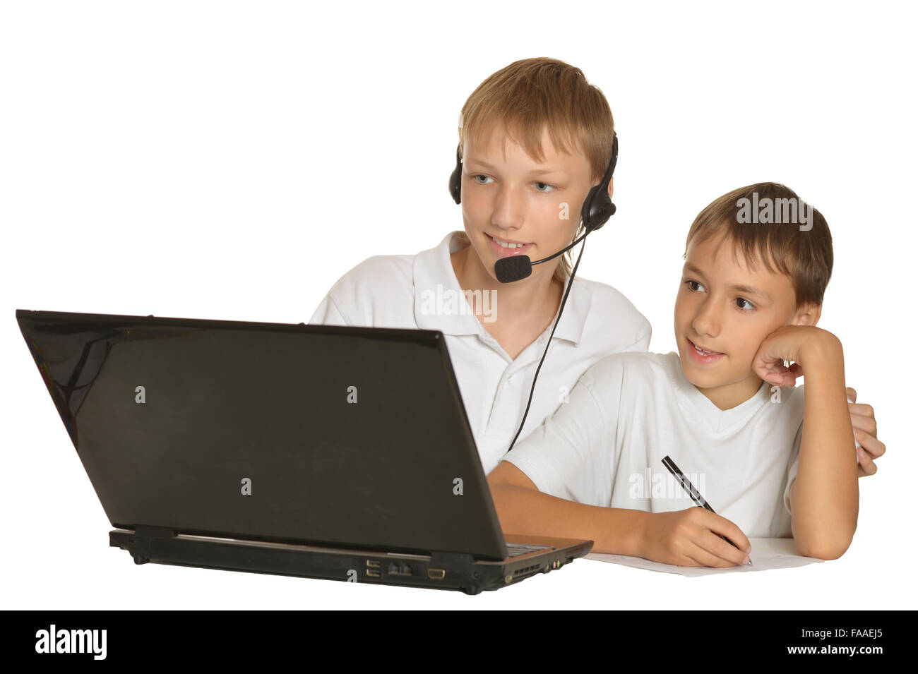 Two brothers with laptop Stock Photo - Alamy