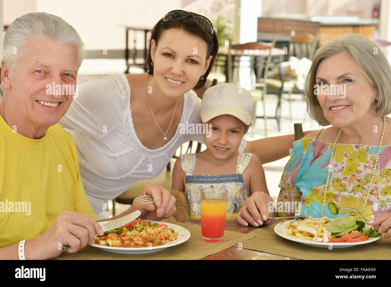 Happy family at breakfast Stock Photo - Alamy
