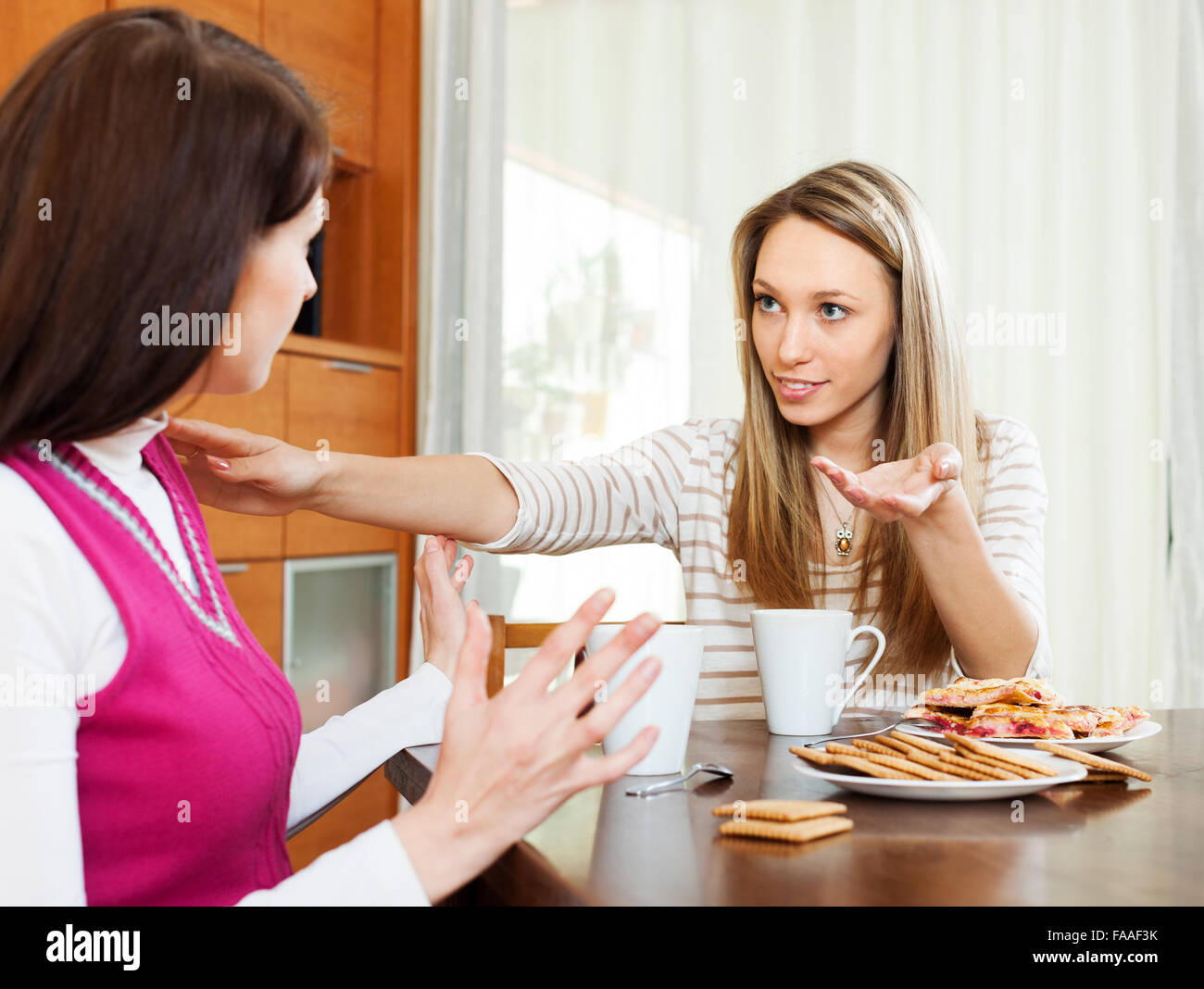Two women chatting over tea hi-res stock photography and images - Alamy