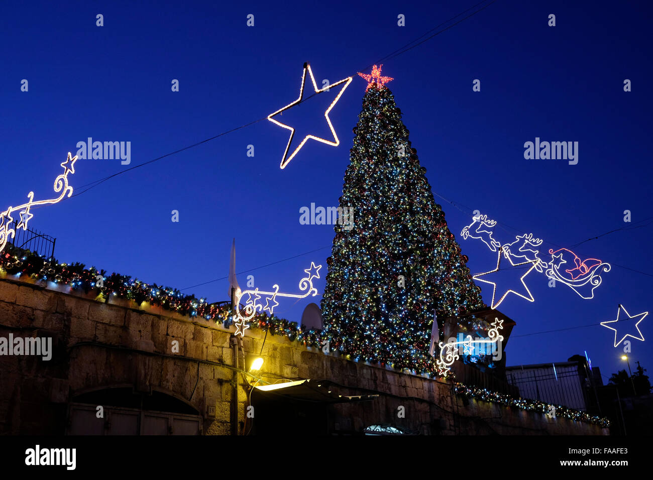 a fully decorated Christmas tree displayed in the Christian Quarter Old ...