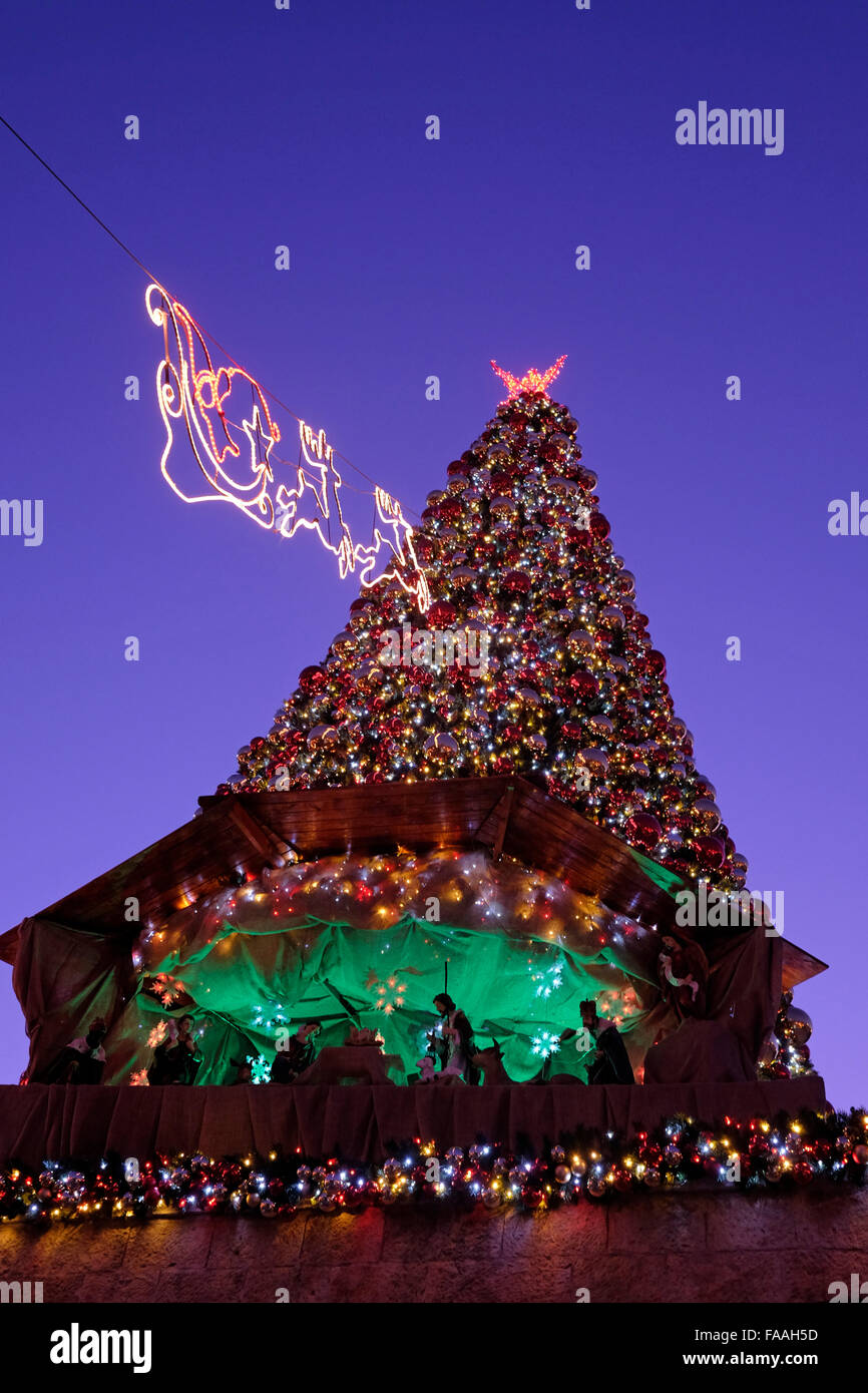 a fully decorated Christmas tree displayed in the Christian Quarter Old ...