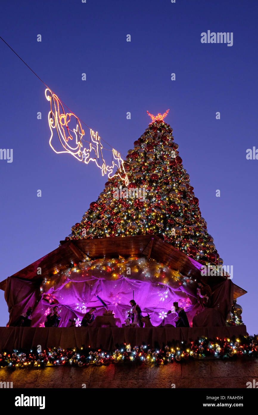 a fully decorated Christmas tree displayed in the Christian Quarter Old ...