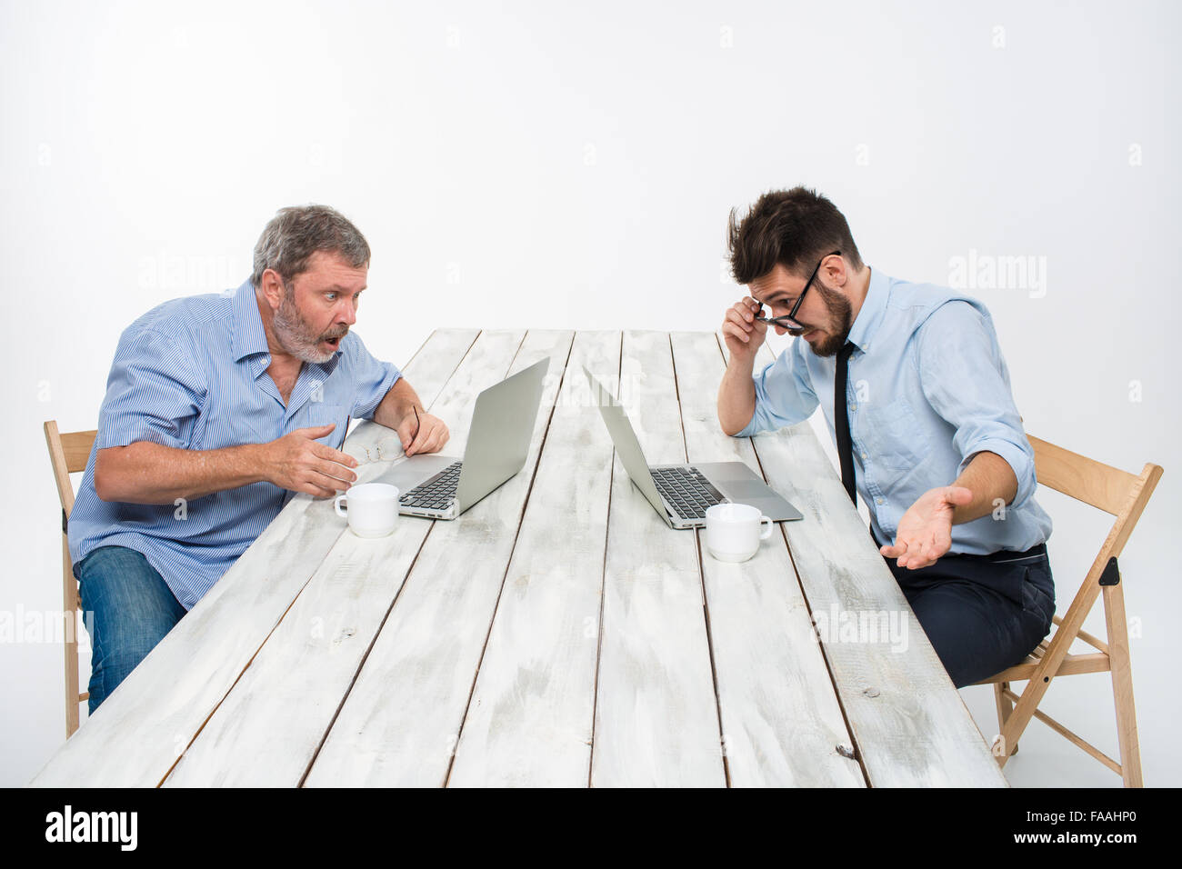 The two colleagues working together at office on white background Stock ...