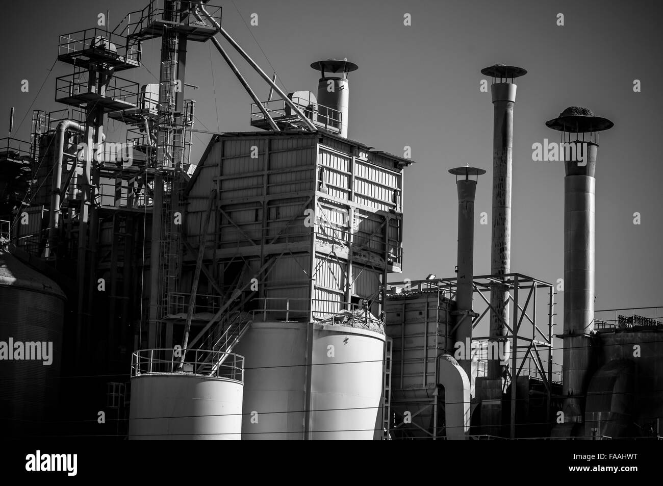 Plant, pipelines and towers, heavy industry overview Stock Photo - Alamy