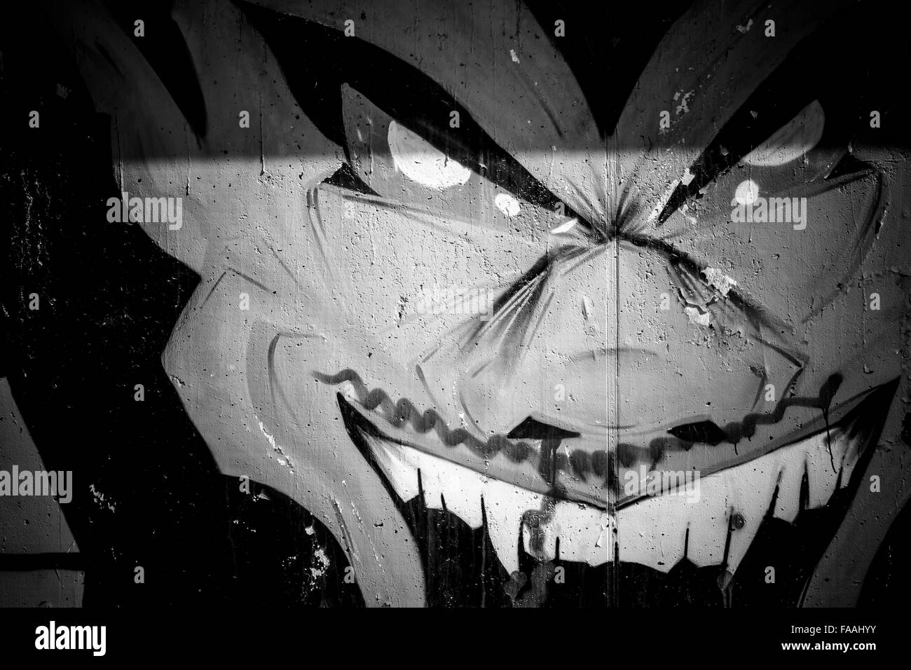 black ink grafitti design in city wall, street art segment Stock Photo ...