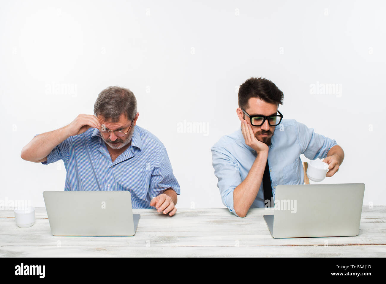 The two colleagues working together at office on white background Stock ...