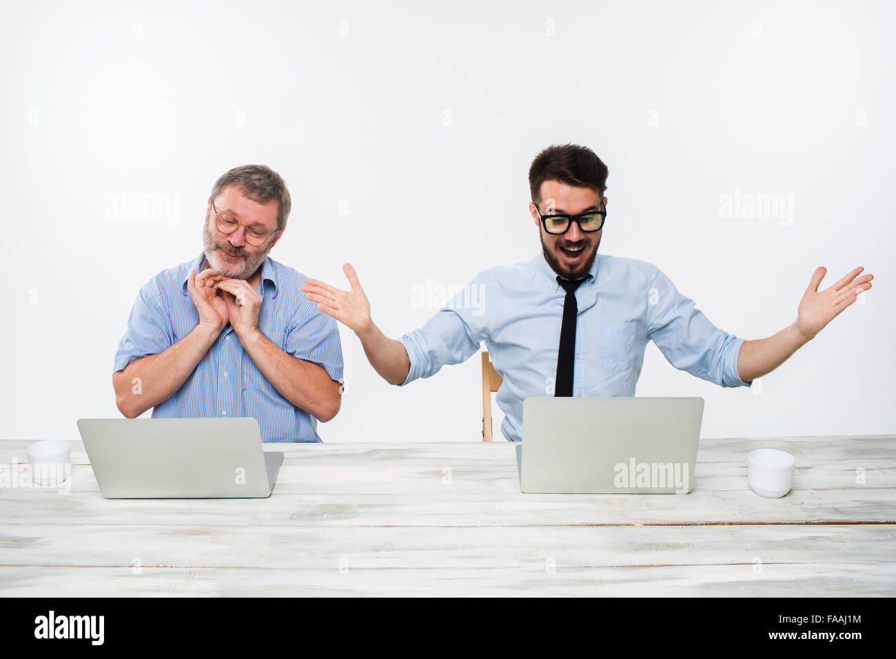The two colleagues working together at office on white background Stock ...
