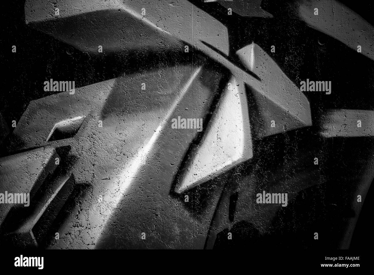 black ink grafitti design in city wall, street art segment Stock Photo ...