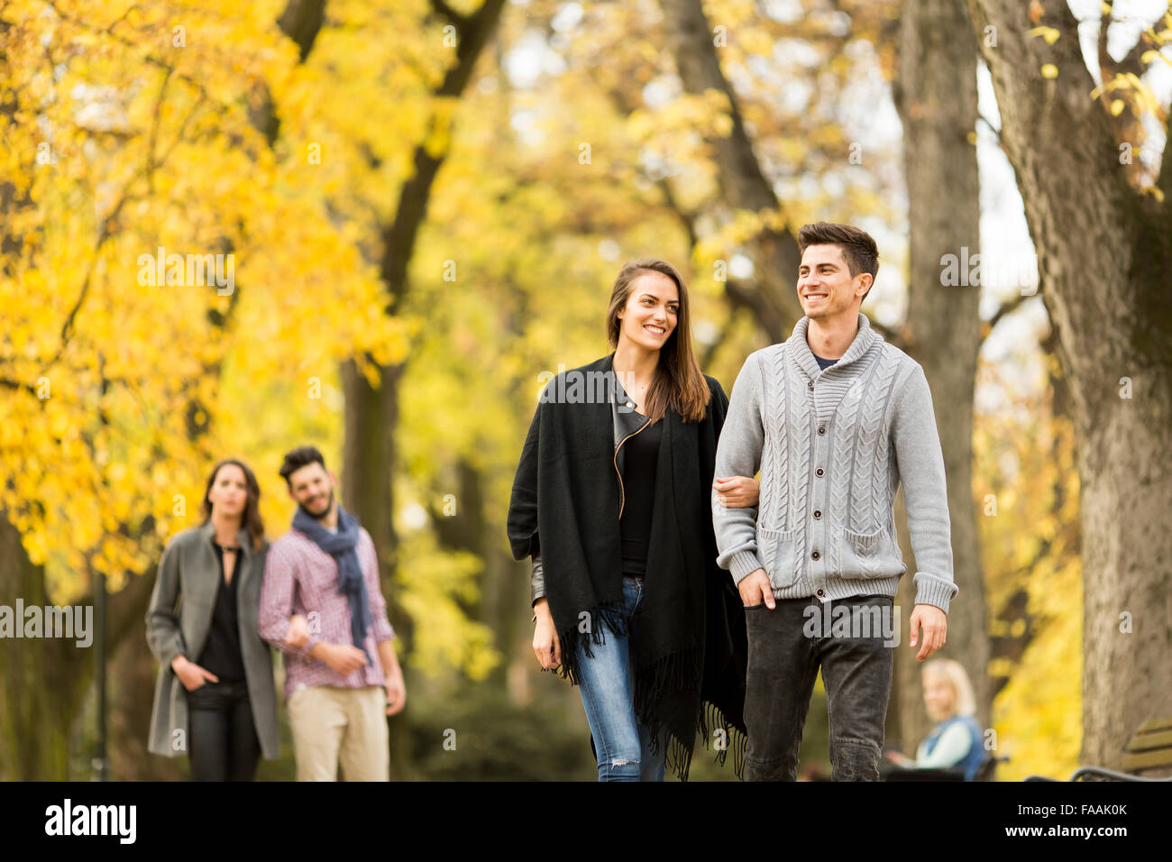 Young female walking in autumn hi-res stock photography and images - Alamy