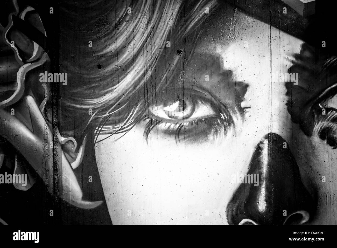 black ink grafitti design in city wall, street art segment Stock Photo ...