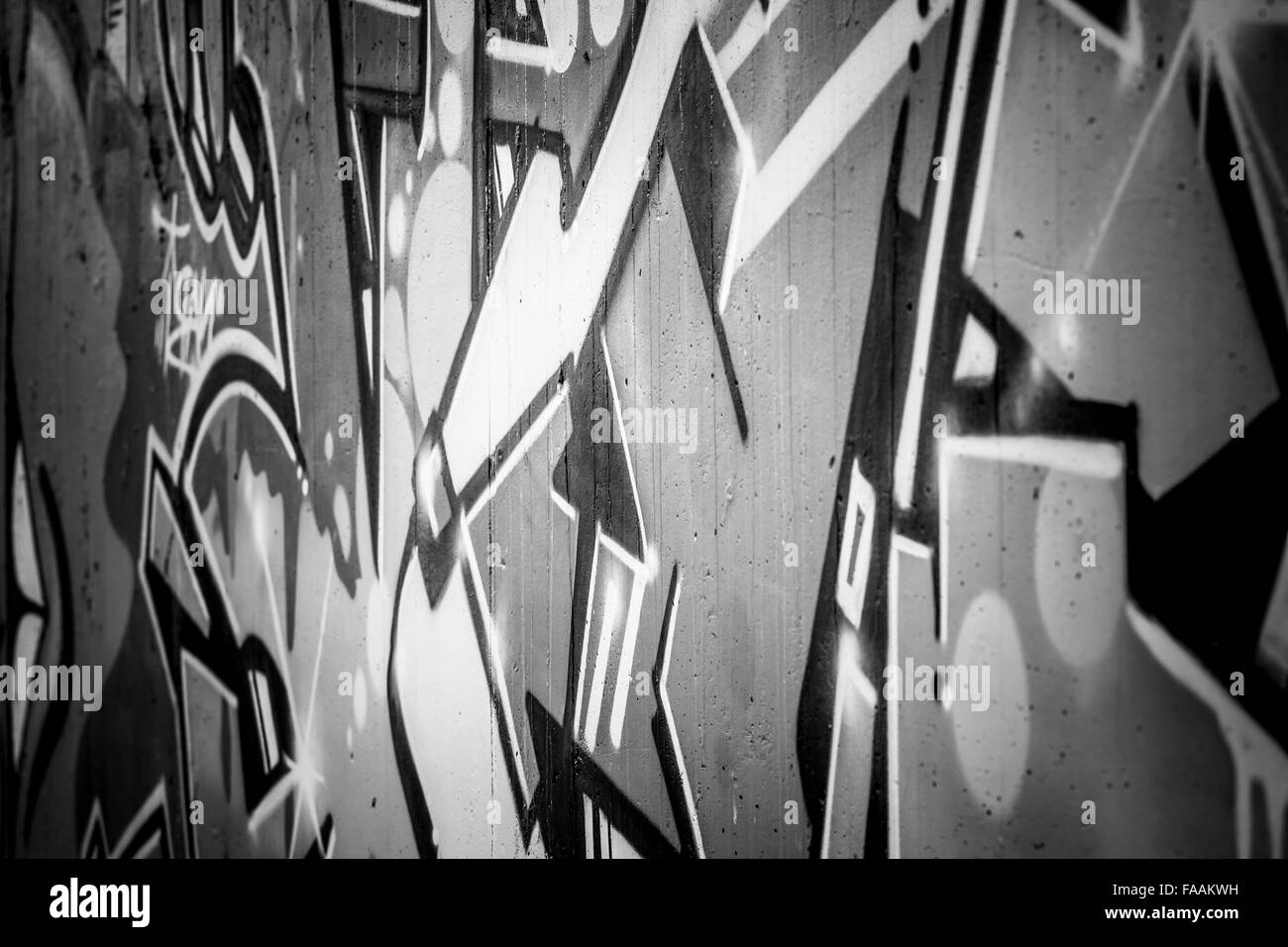 black ink grafitti design in city wall, street art segment Stock Photo ...