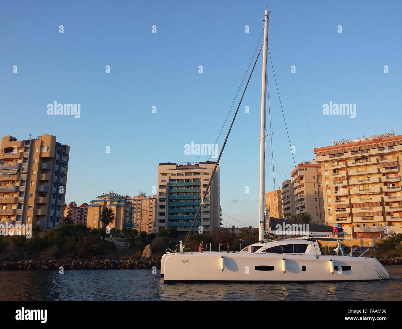 catamaran sailing at sunset Stock Photo - Alamy