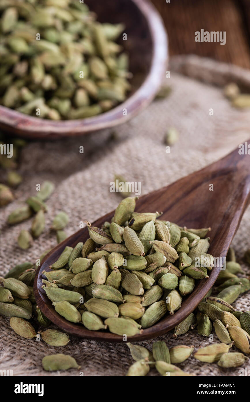 Cardamon (seeds) as close-up shot on vintage wooden background Stock ...