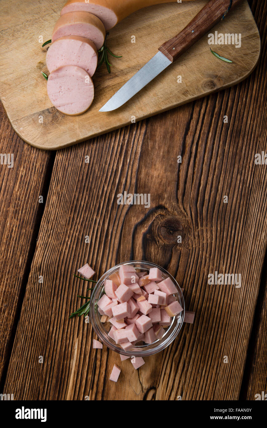 Portion of Baloney on rustic wooden background (close-up shot Stock ...