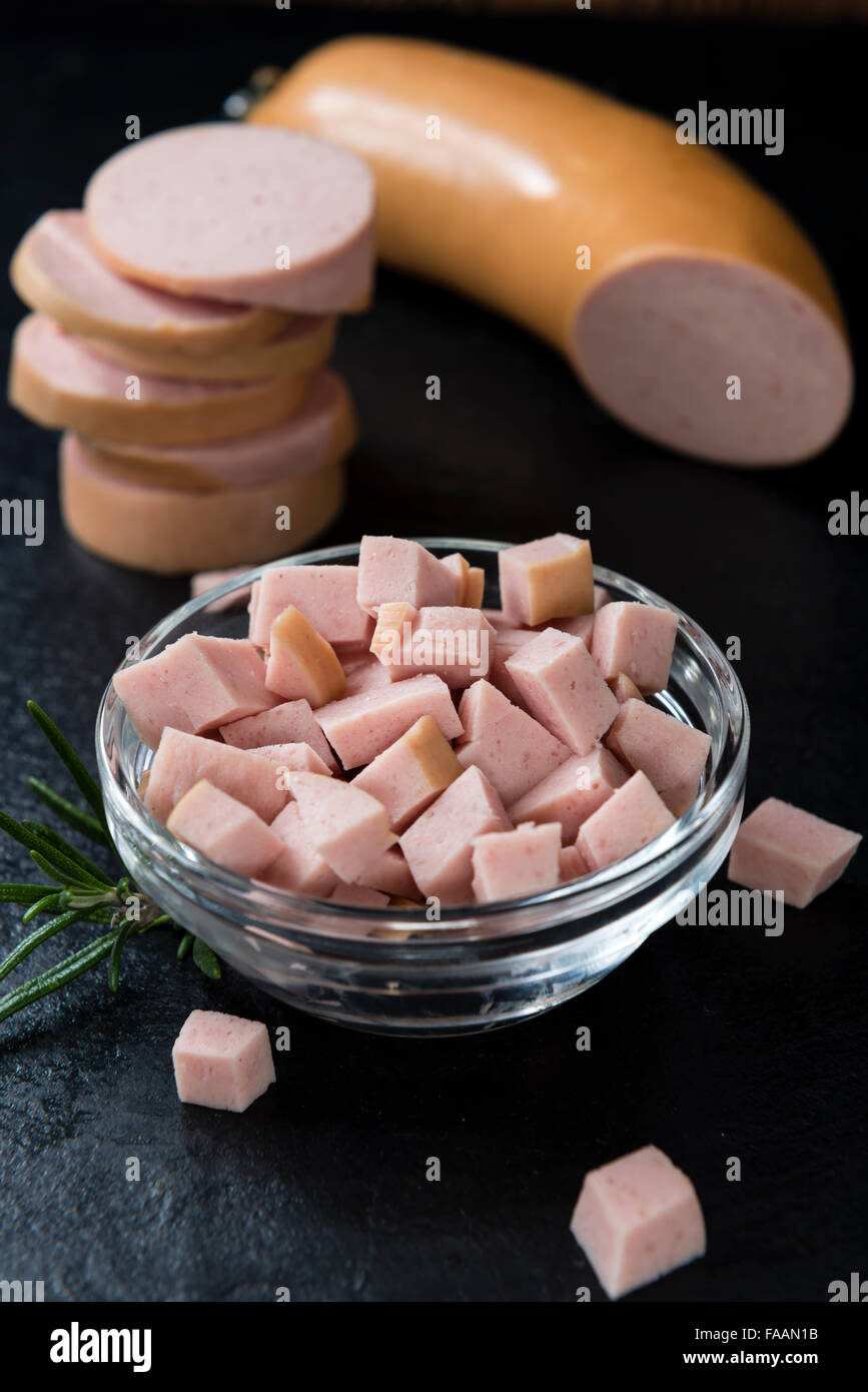 Portion of Baloney on rustic wooden background (close-up shot Stock ...