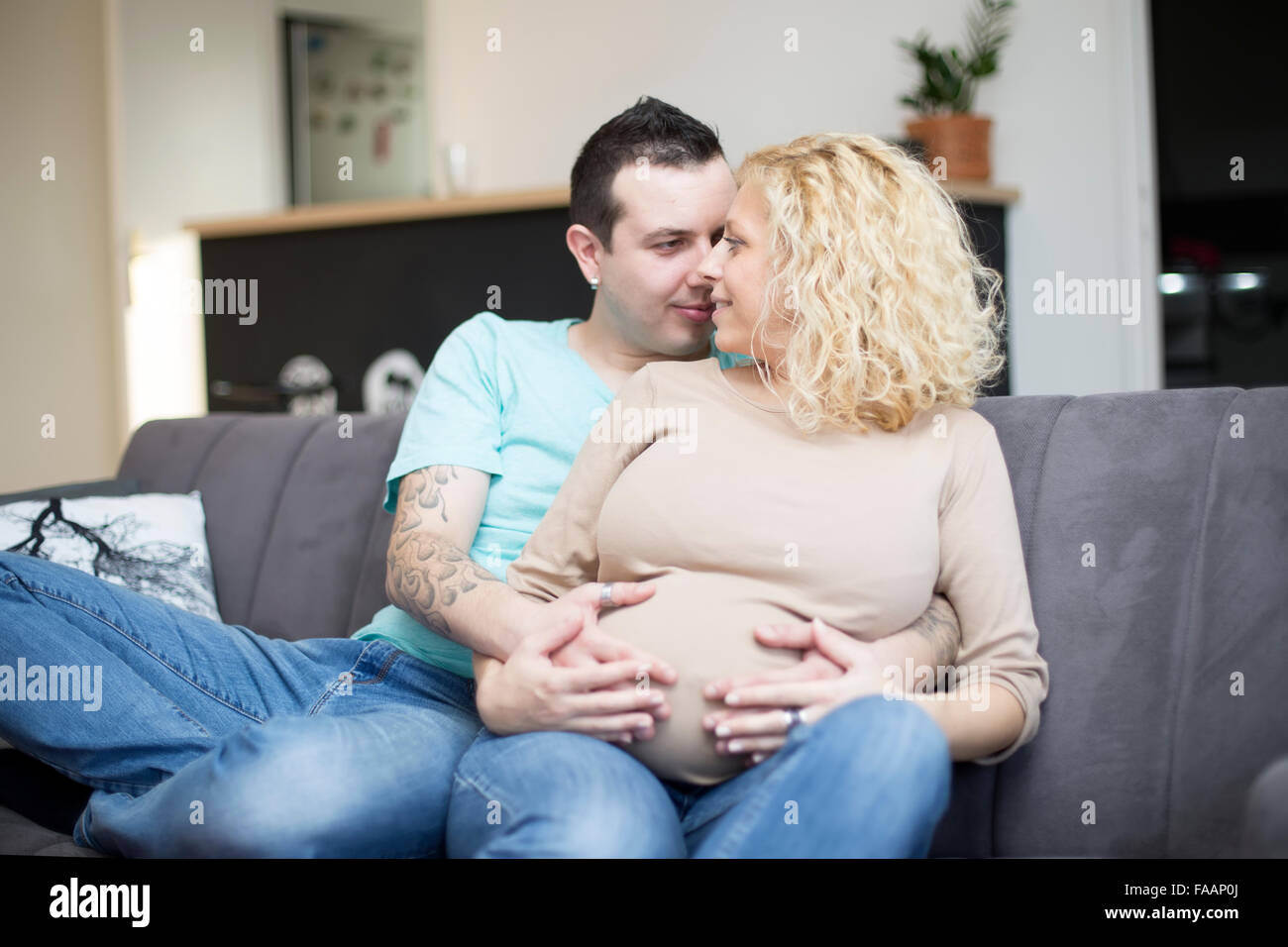 Loving couple wait for baby Stock Photo - Alamy