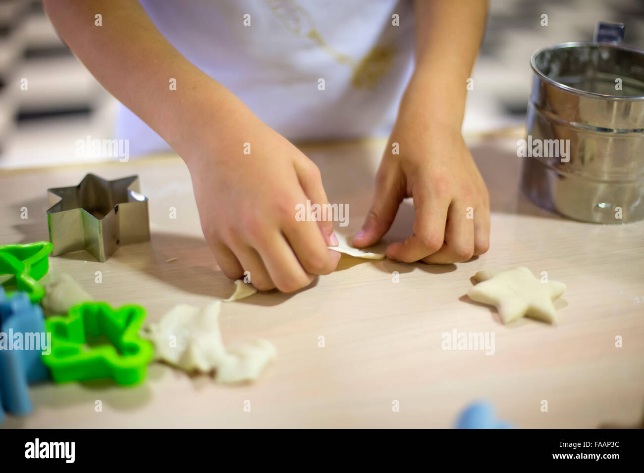 Boy making cookies Stock Photo - Alamy