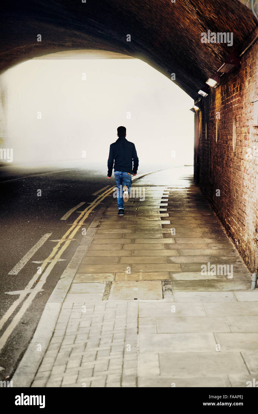 Man Running Path Tunnel Stock Photo - Alamy