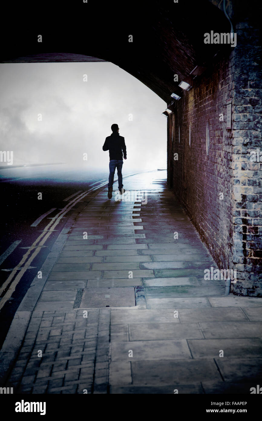 Man Running Path Tunnel Stock Photo - Alamy