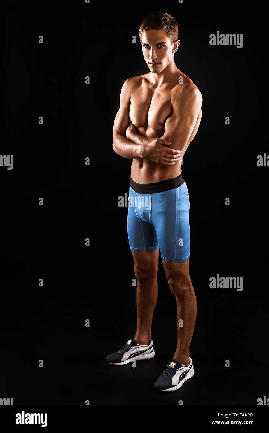 Young sporty well formed man Stock Photo - Alamy