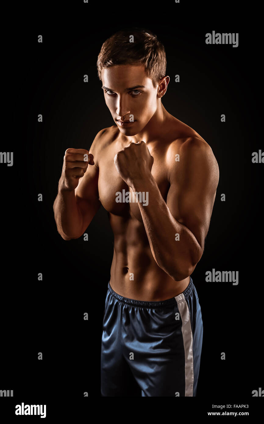 Young sporty well formed man Stock Photo - Alamy