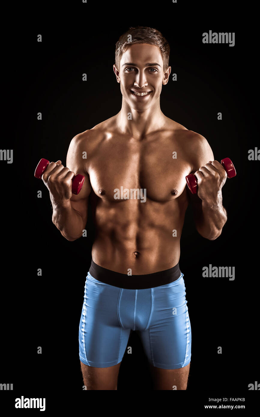 Young sporty well formed man Stock Photo - Alamy