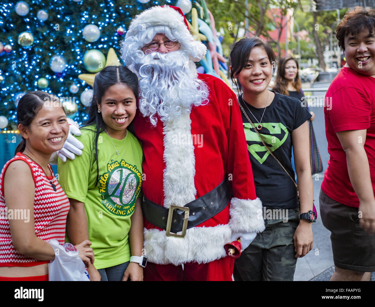 Santa claus poses for photos hi-res stock photography and images - Alamy