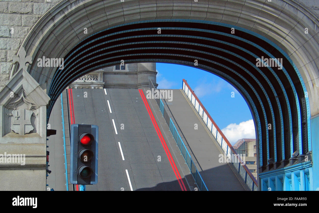 Tower Bridge raising the road, London, England Stock Photo - Alamy