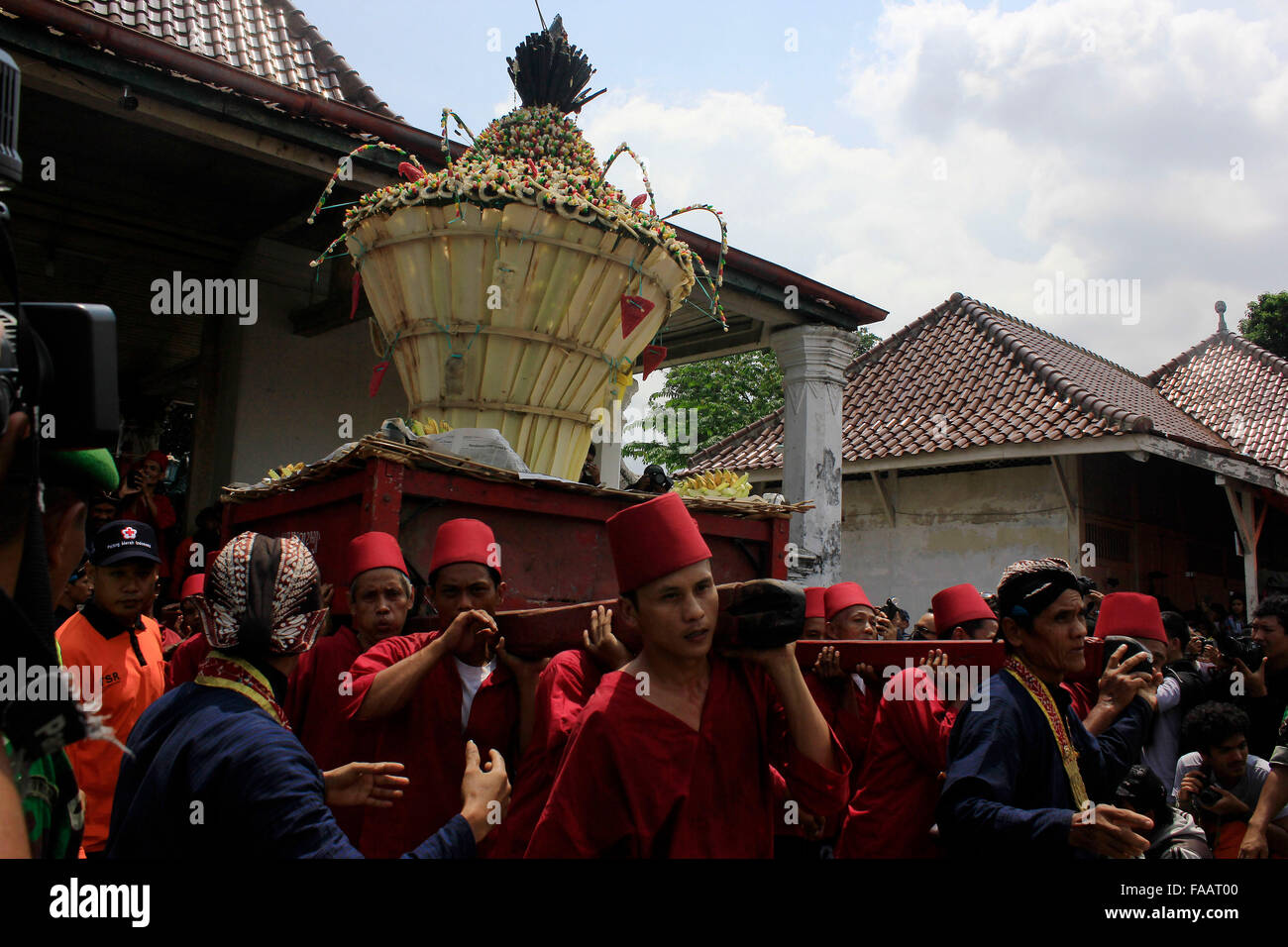 Courtiers carrying the gunungan while Grebeg Maulud of Yogyakarta ...