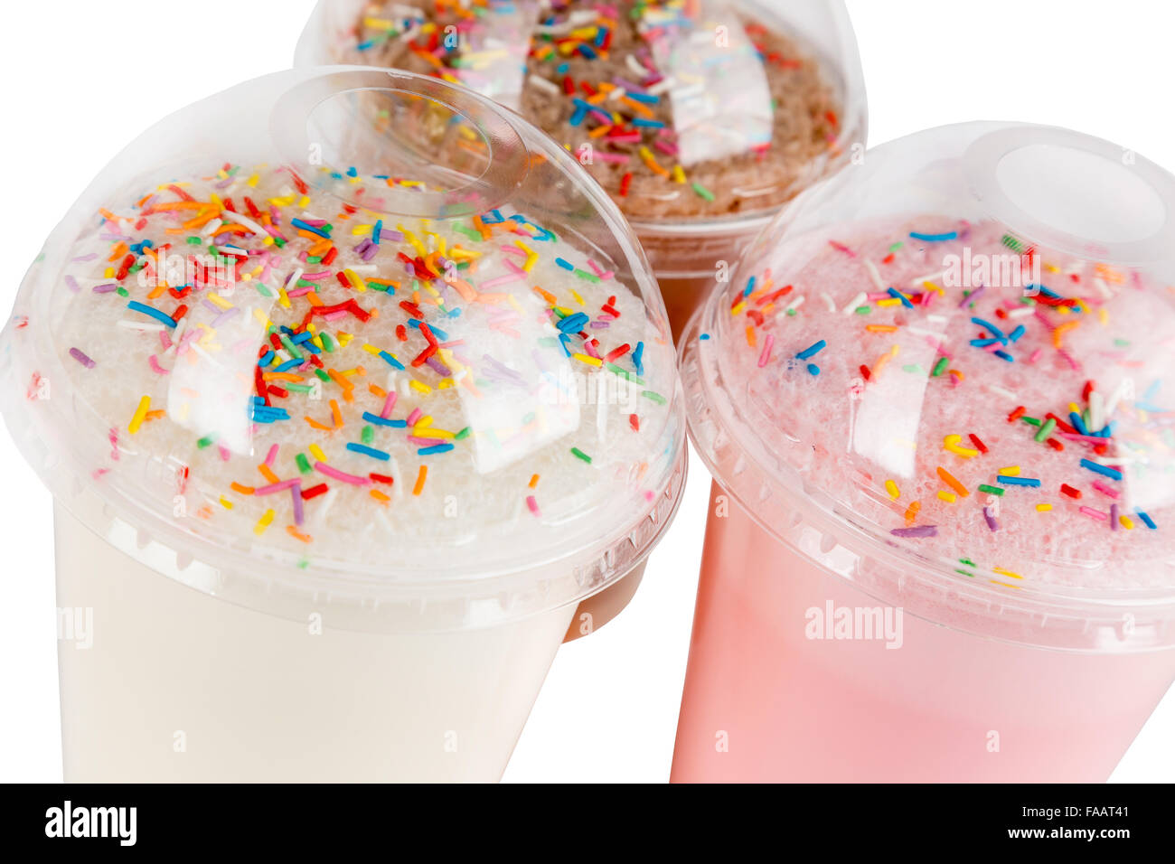 different milkshake cocktails with bubbles and multicolor bakery sweet ...