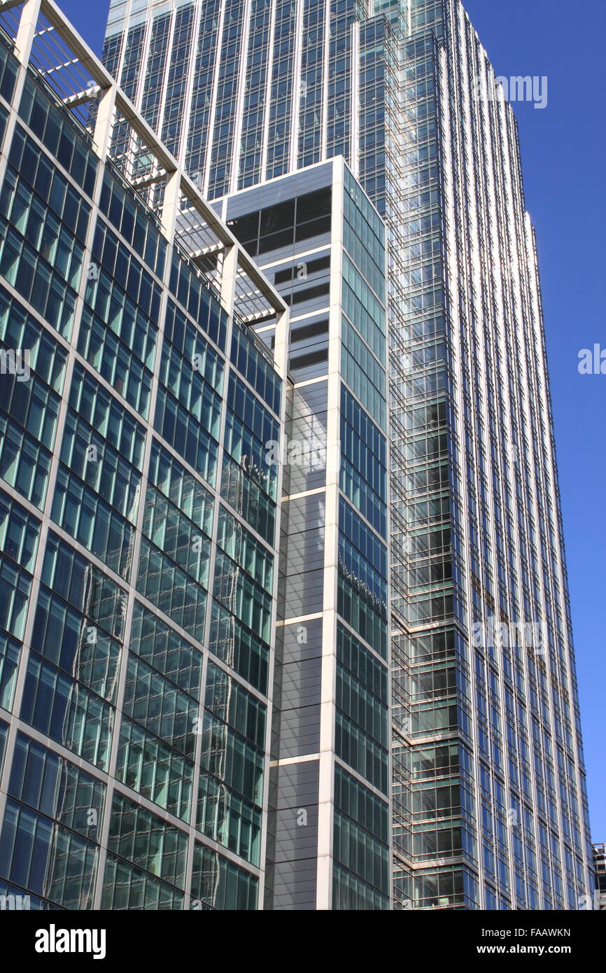 Modern glass skyscraper on a blue sky background Stock Photo - Alamy