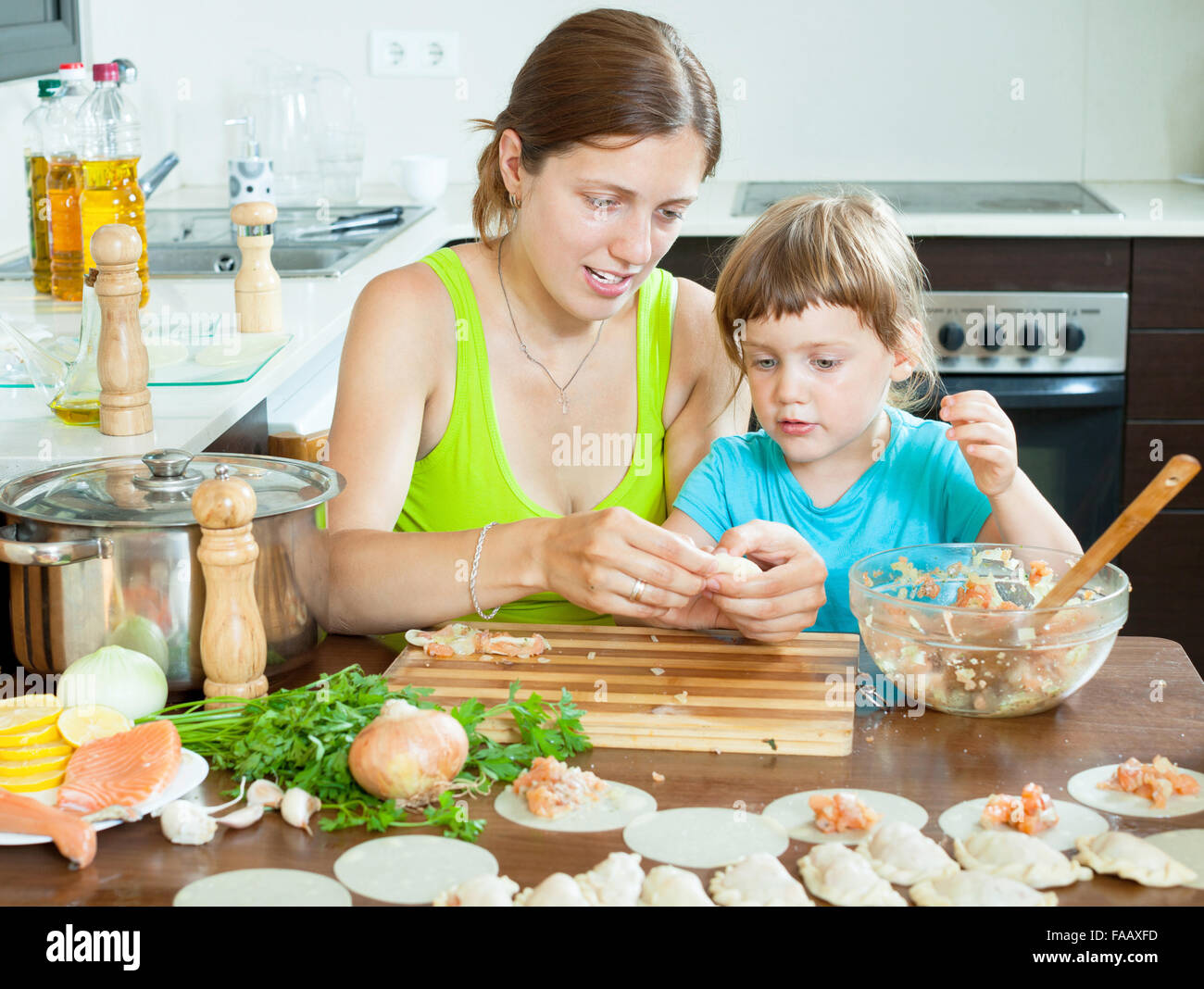 Happy child cooking meat dumplings hi-res stock photography and images ...