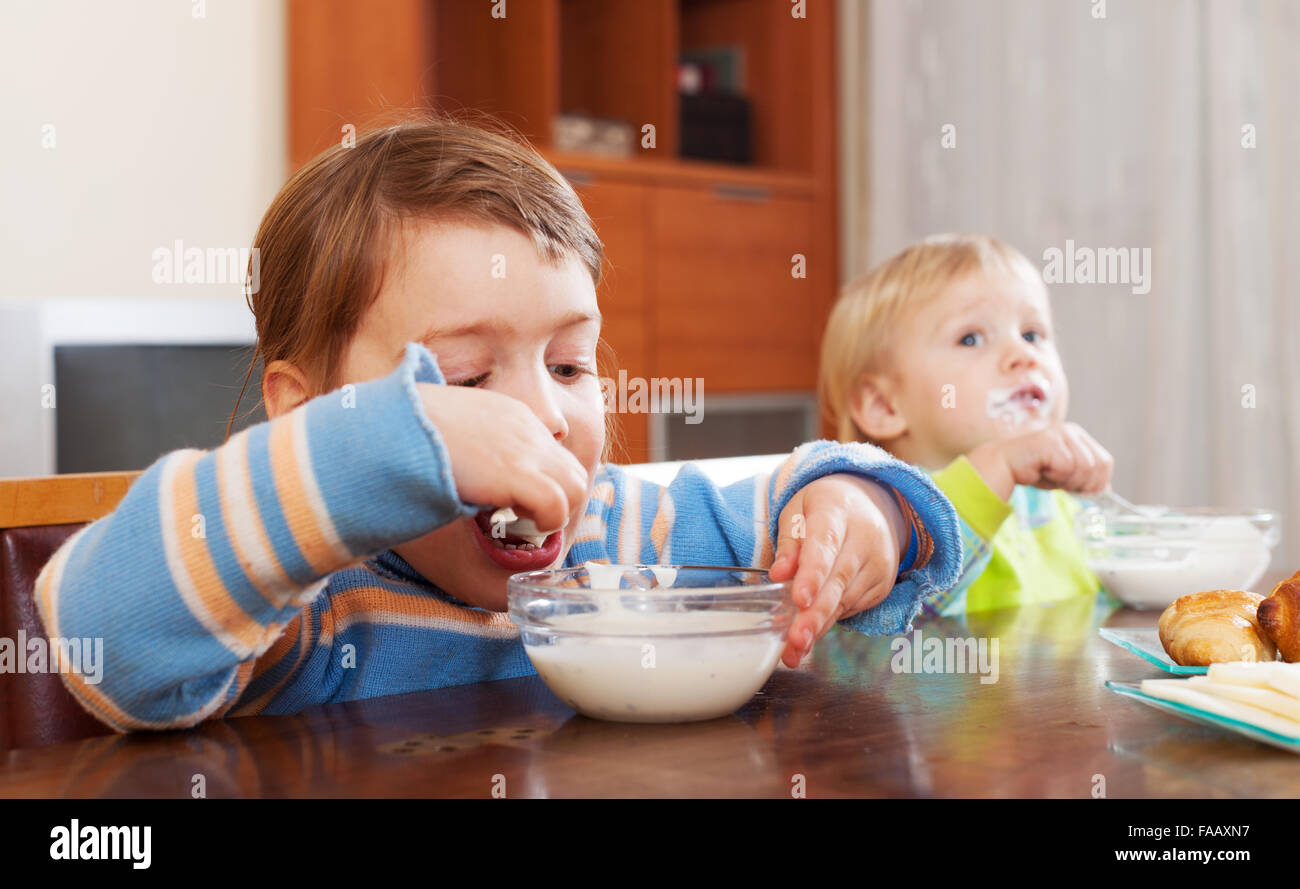 children eating dairy breakfast in morning Stock Photo - Alamy