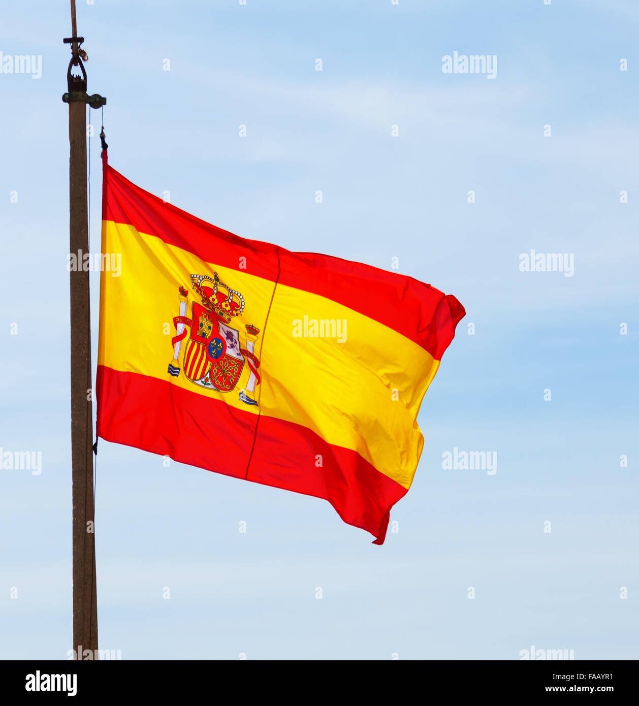 Flying Spain flag over sky background Stock Photo - Alamy