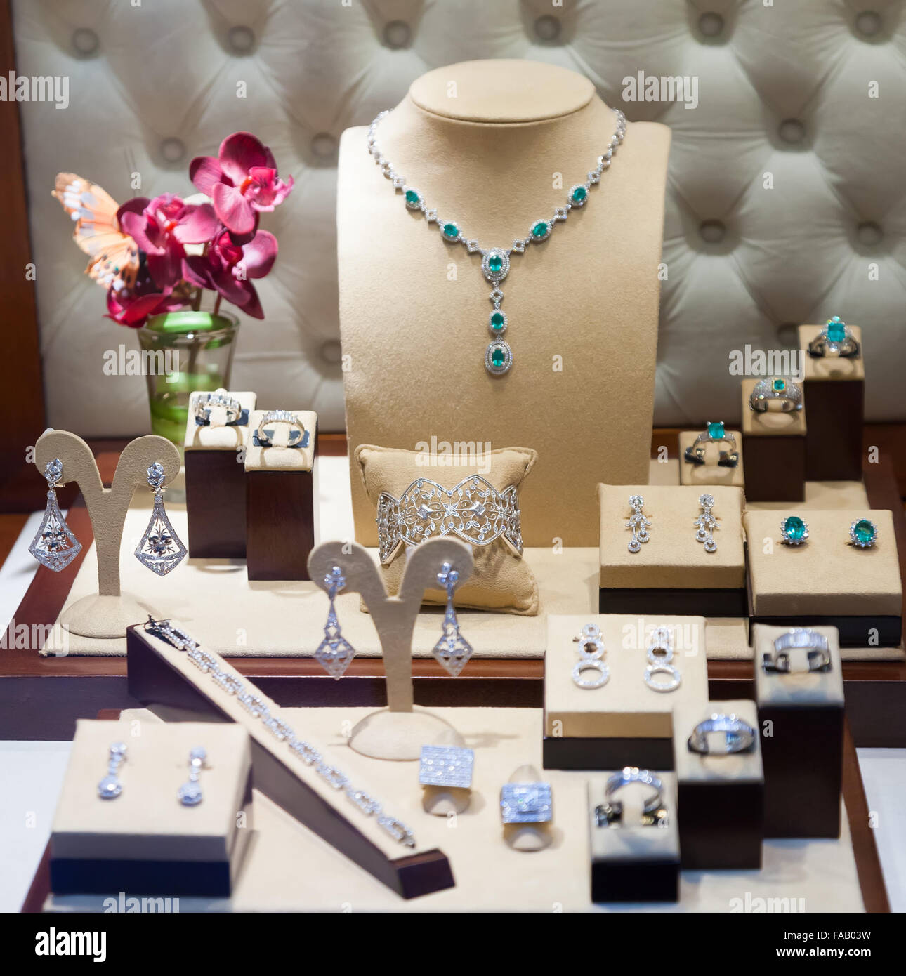 silver jewelry at showcase of jewelry store Stock Photo - Alamy