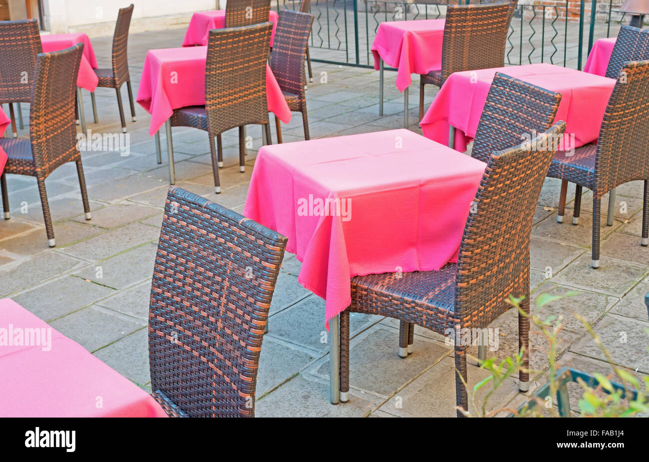 Wood chairs square tables hi-res stock photography and images - Alamy