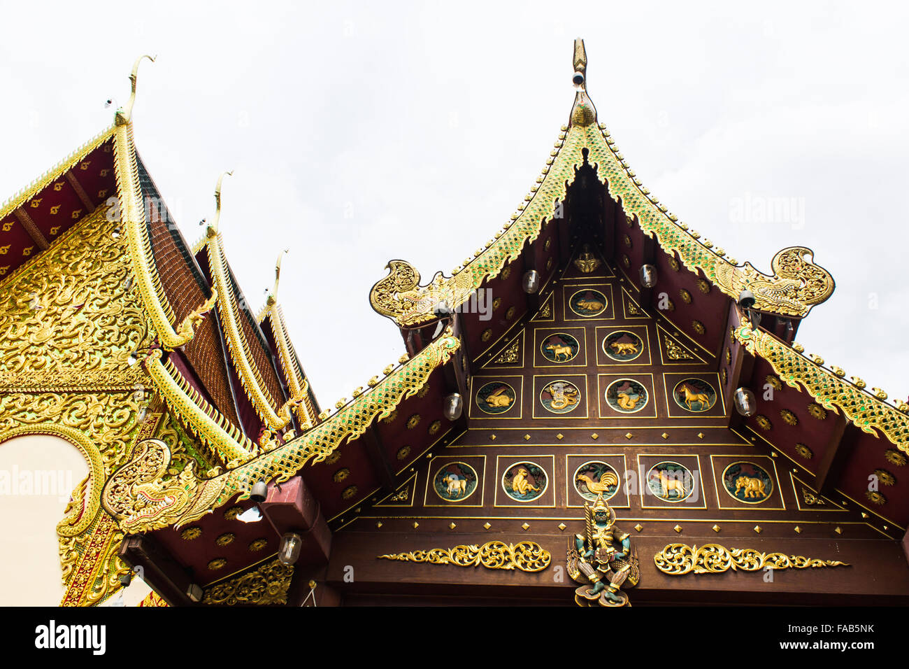 Roof of ancient Thai temple, wood chapel Stock Photo - Alamy